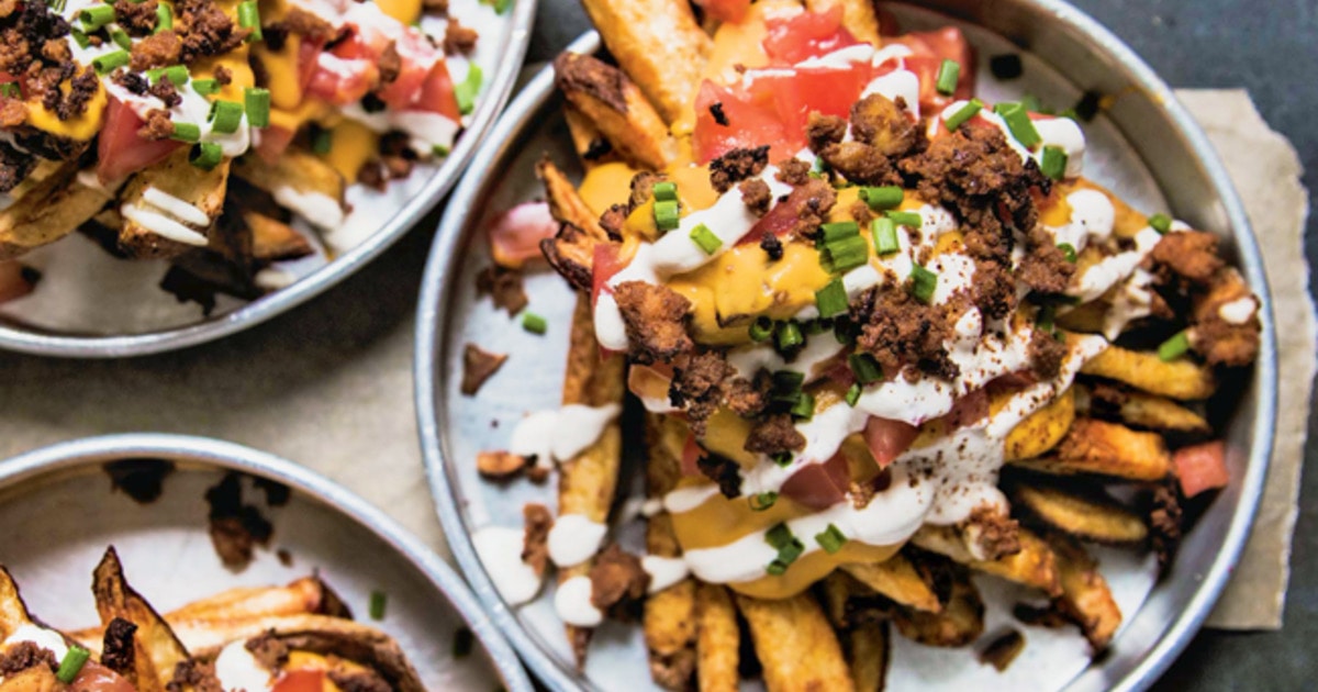 Supreme Vegan Nacho Fries With Tofu Bacon Crumbles | VegNews