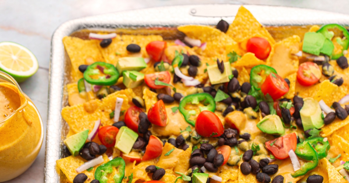 Loaded Cheesy Sheet-Pan Vegan Nachos | VegNews